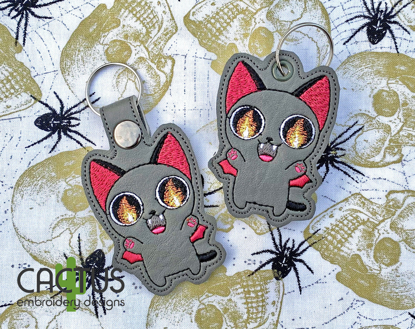 Possessed Cat Set of Eyelet Fob & Snap Tab – Cactus Embroidery Designs